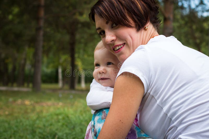 Small Cute Baby and Nice Mom Stock Photo - Image of clever, female ...