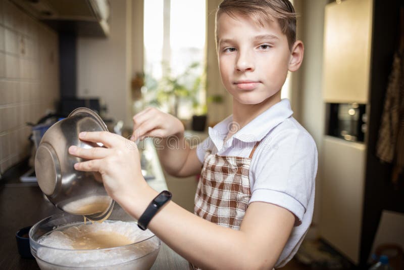 Small Cute Boy Cooking Dessert on the Kitchen Stock Photo - Image of ...