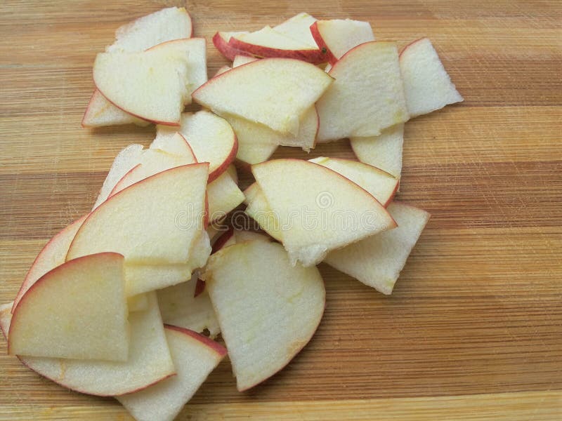 Red apple cut two pieces stock image. Image of fruit - 28074789