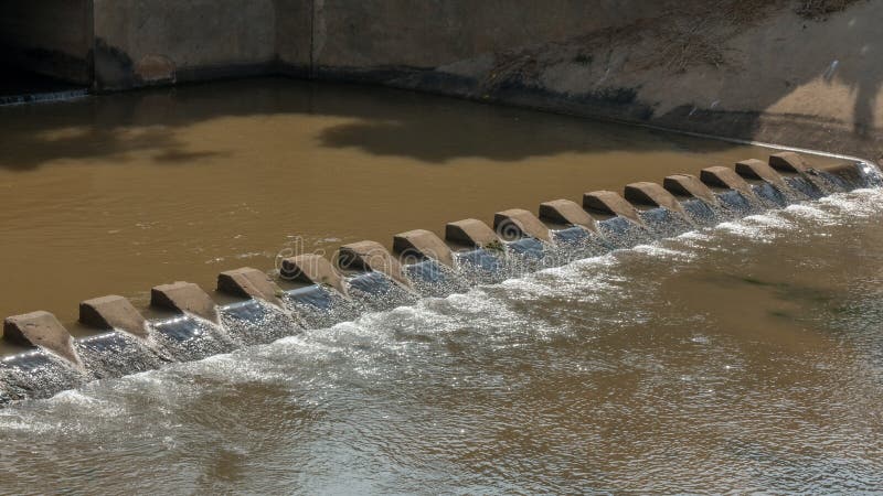 Rubber Dam And Flowing Water On A River Stock Photo - Image of fast ...