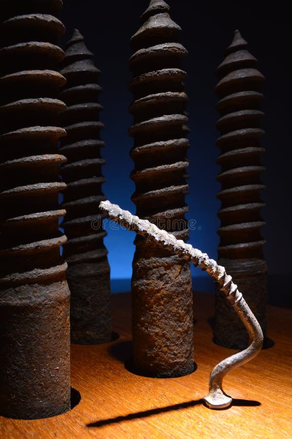 Small, Damaged, Corroded Paired with Oversized Screws Stock Photo ...
