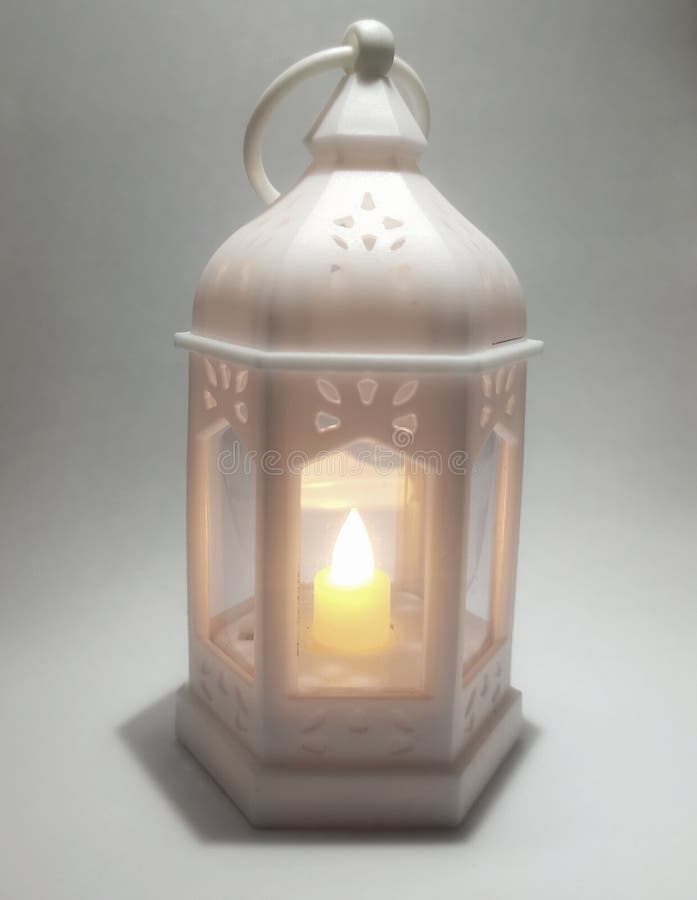 A Small, Decorative Lantern with a Warm, Inviting Light. the Hexagonal ...