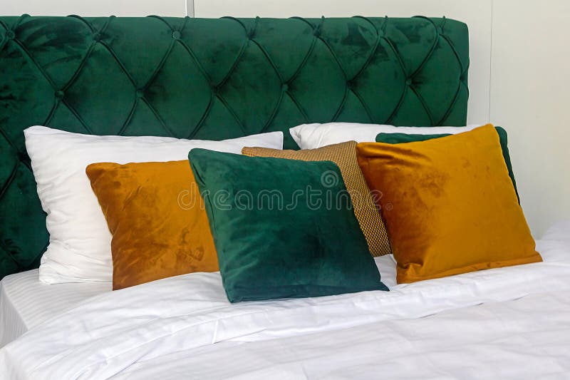 Small Decorative Pillows on Bed Stock Image - Image of decor ...