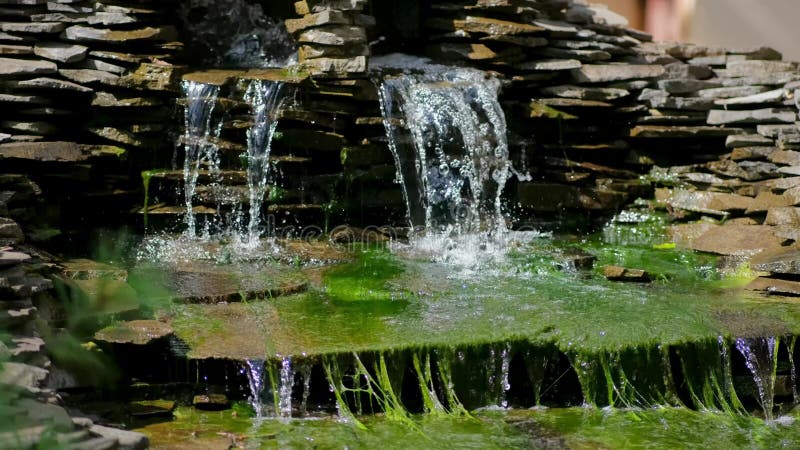 A Small Decorative Waterfall in the Park . Landscape Design Stock ...