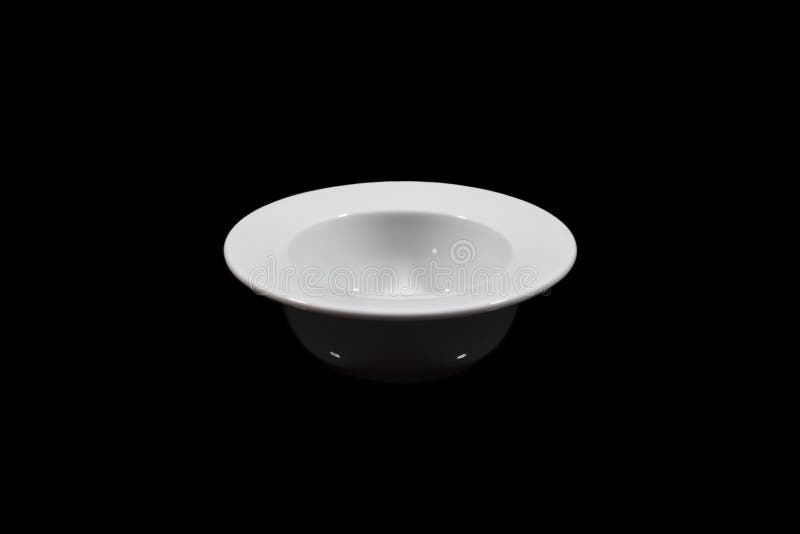 Small Deep Plate on Black Background from Side Stock Image - Image of ...
