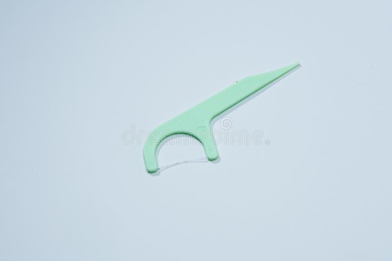 Small Dental Floss Instrument on White Background Stock Photo - Image ...