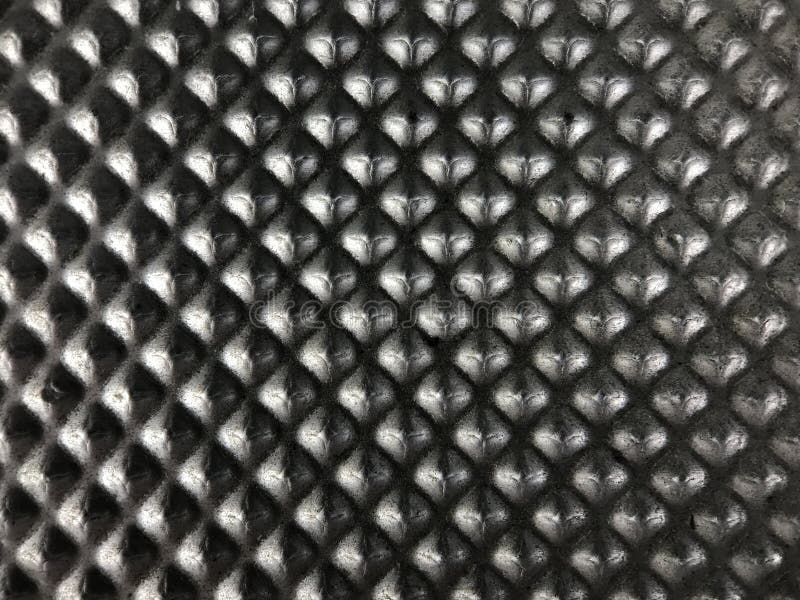 Small Die-cast Pyramids on a Metal Sheet Up Close Stock Image - Image ...