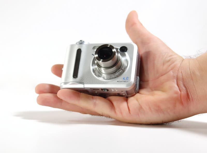 Small digital camera stock photo. Image of camera, hand - 193372