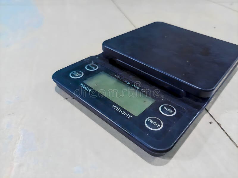 Small Digital Weighing Scale on White Ceramic Floors Stock Photo ...