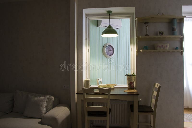 A Small Dining Room with a View Out into the Living Area Stock Image ...