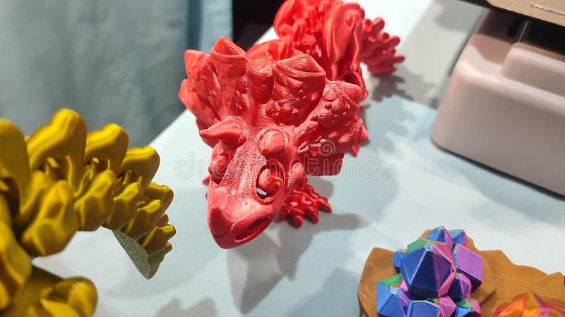Small Dinosaur Skeleton Printed on 3D Printer from Molten Plastic of ...