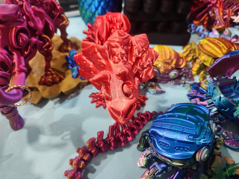 Small Dinosaur Skeleton Printed on 3D Printer from Molten Plastic of ...