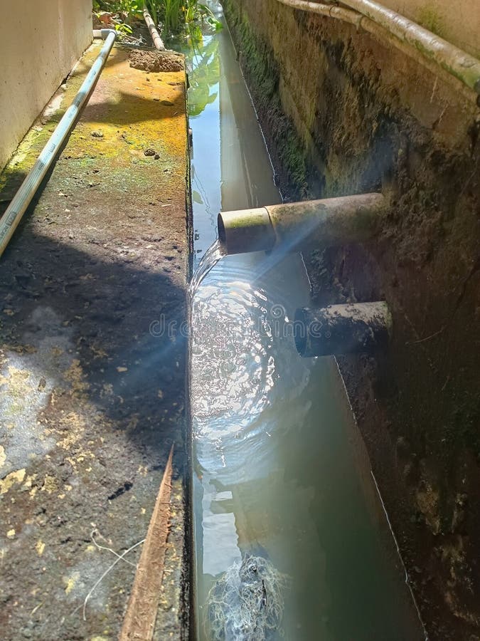 A small ditch drain pipe stock image. Image of drain - 263336255