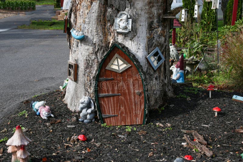 Small Door on Bottom of a Tree Trunk for Gnome and Elf Home Editorial ...
