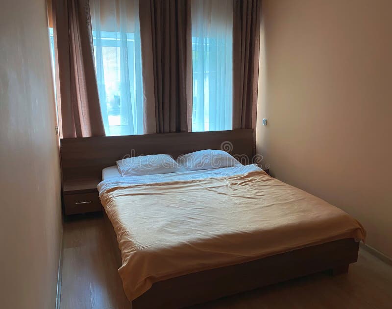 Small Double Room in the Hotel with a Small Area in Beige Colors with a ...