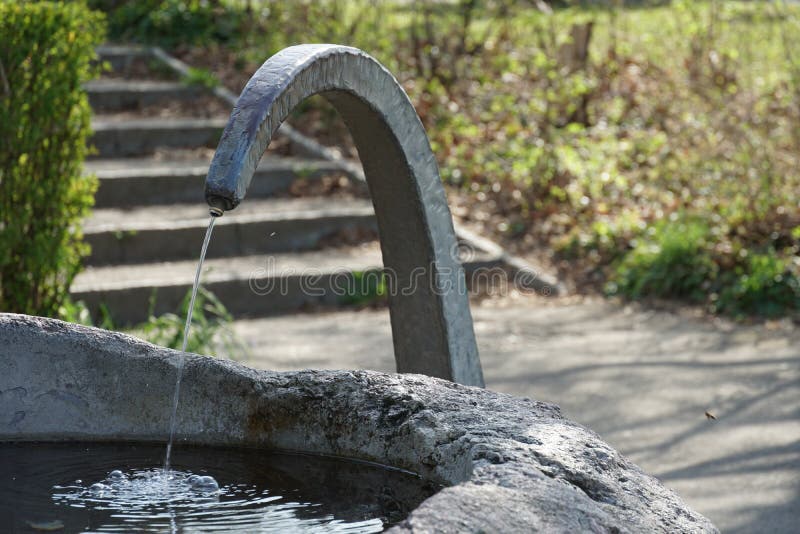 A Small Drinking Well of Stone and Metal, a Source of Drinking Water ...