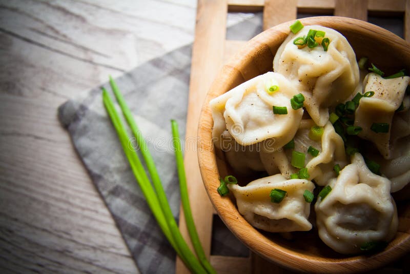Small dumplings in bowl stock photo. Image of culinary - 64231114