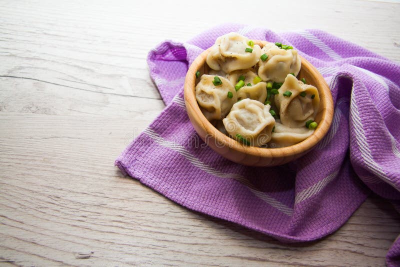 Small dumplings in bowl stock photo. Image of culinary - 64231114