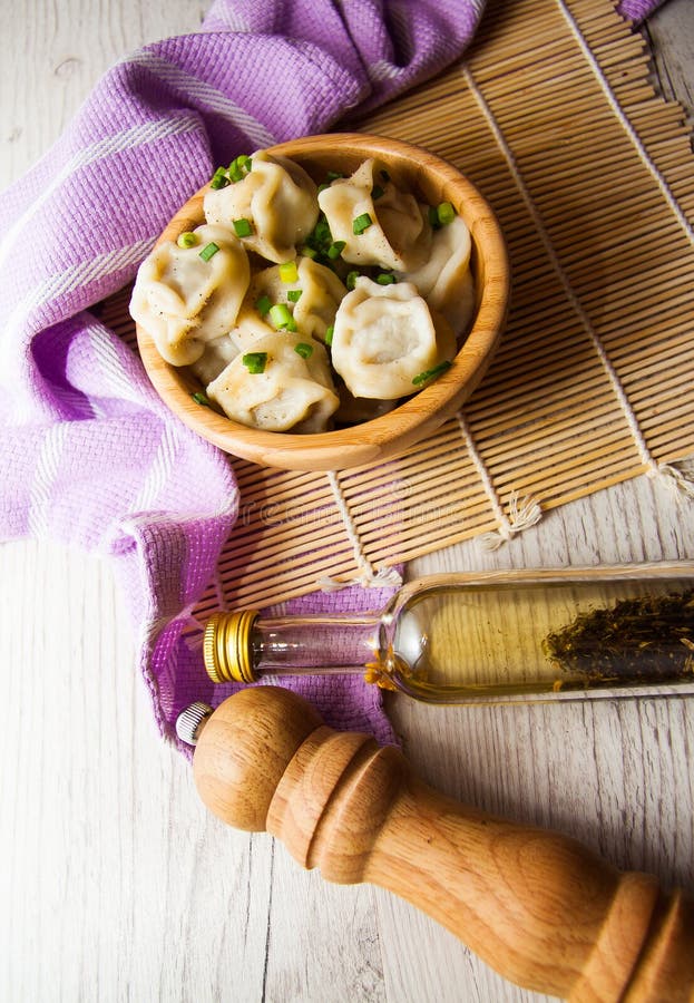 Small dumplings in bowl stock photo. Image of culinary - 64231114