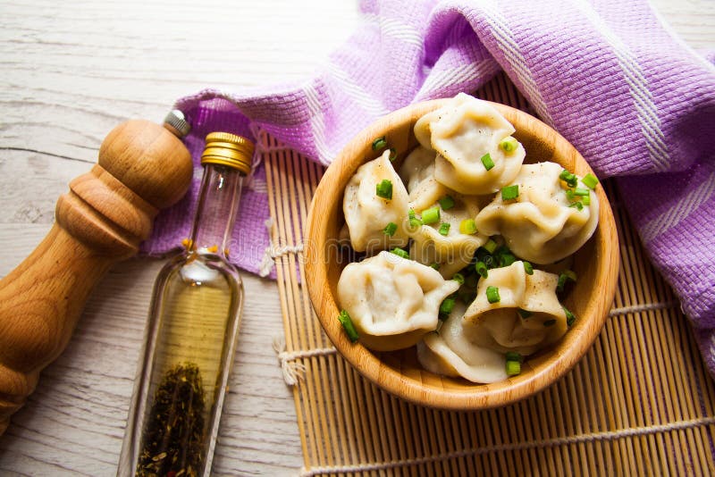 Small dumplings in bowl stock photo. Image of culinary - 64231114