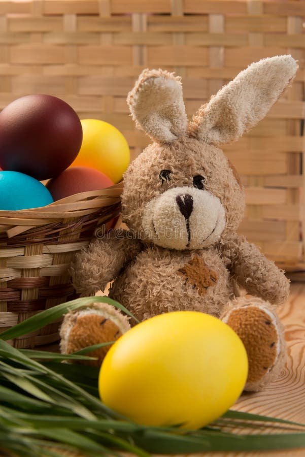 Small Easter Bunny with Beautiful Colored Eggs Stock Photo - Image of ...