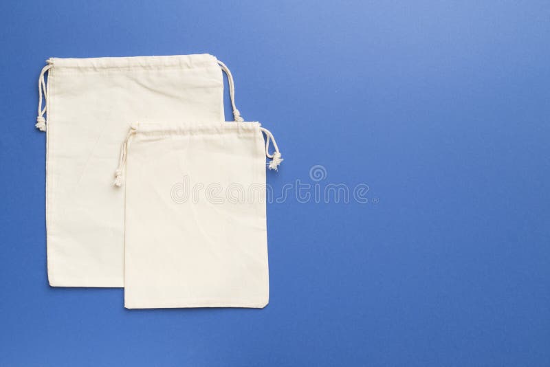 Small Eco Sacks on Color Background. Top View Stock Photo - Image of ...