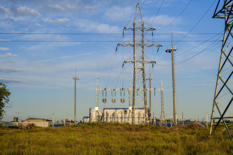 Small Electrical Substation in the Field Against the Blue Sky ...