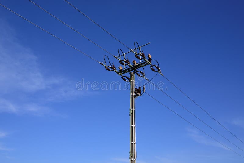 A Small Electricity Pylon with Power Cables and Resistors, Against a ...