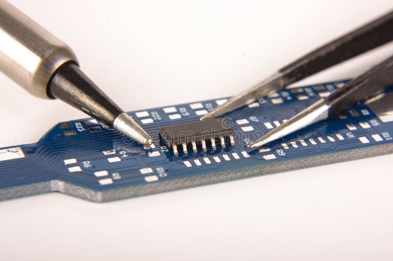 Tiny Integrated Circuit on Empty PCB Board Stock Photo - Image of ...