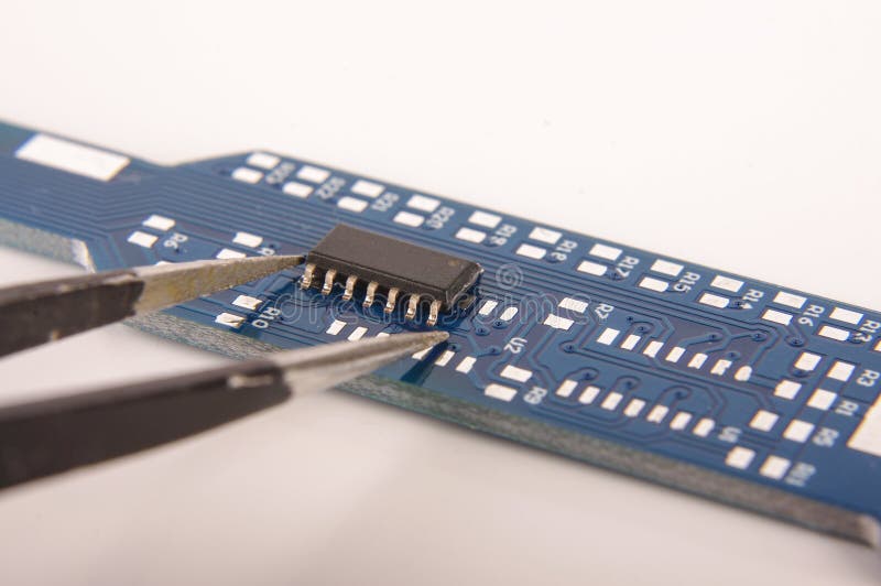 Tiny Integrated Circuit on Empty PCB Board Stock Photo - Image of ...