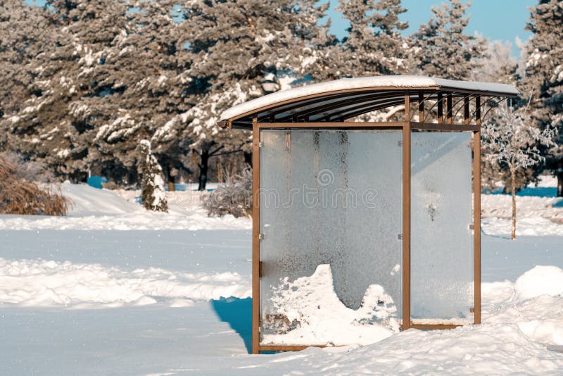 Empty Bus Stop with Frozen Glass in a Cold Winter Day Stock Image ...