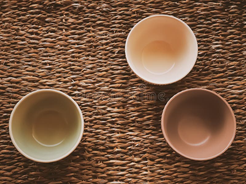 Small Empty Ceramic Measure Bowls on Rustic Wicker Background, Food ...