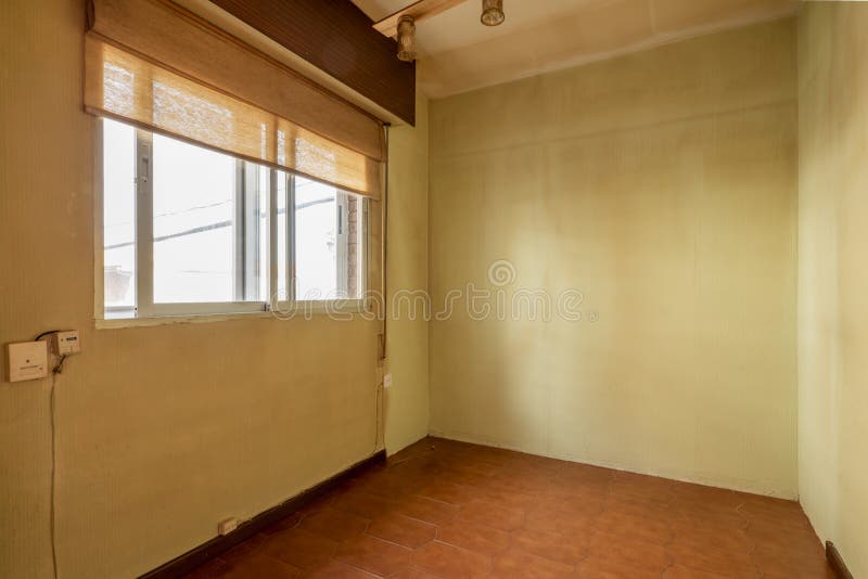 Small Empty Room with Fabric Blind on the Window and Brown Stoneware ...