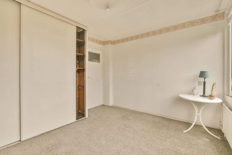 A Small Empty Room with a Large Wardrobe Stock Photo - Image of ...