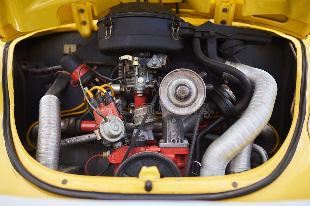 A Small Engine, an Old Cute Car, in the Back Stock Image - Image of ...