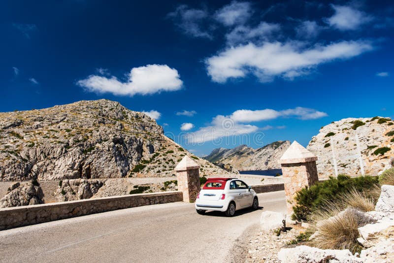 Small European Car on Winding Road of Mallorca Stock Photo - Image of ...