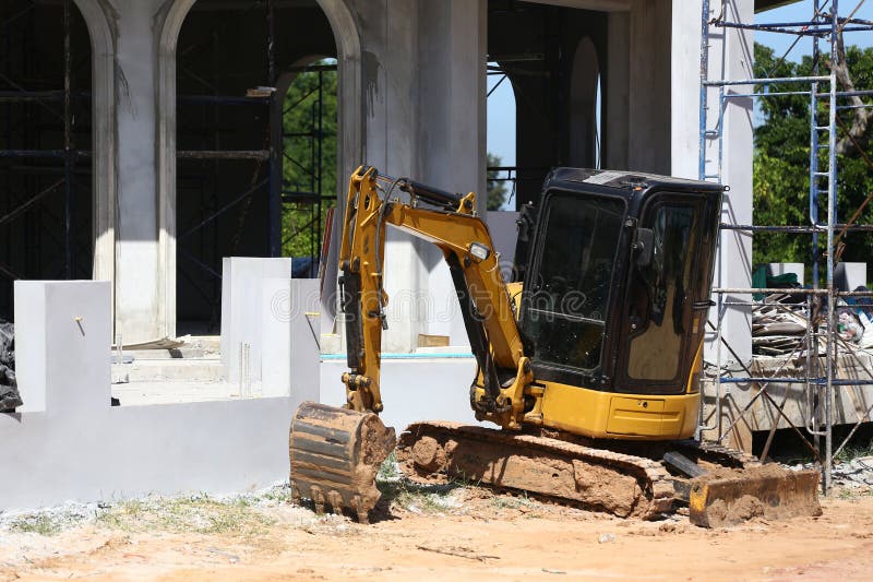 Small Excavator Was Parked in a Construction Zone Stock Image - Image ...