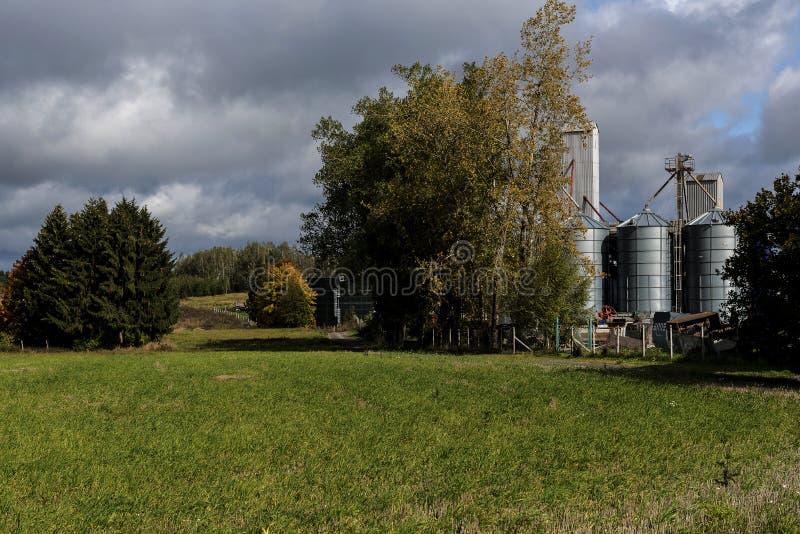 A Small Factory Behind a Village between Trees Stock Photo - Image of ...