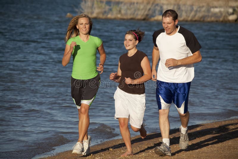 Small family running stock photo. Image of lifestyle - 15189898