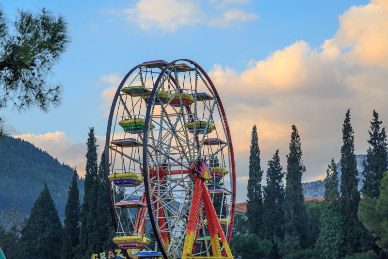 Small Ferriswheel among Trees Stock Image - Image of avenue, family ...