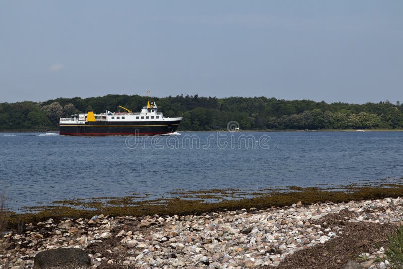 Small Ferry Leaving Port stock photo. Image of water - 23670550