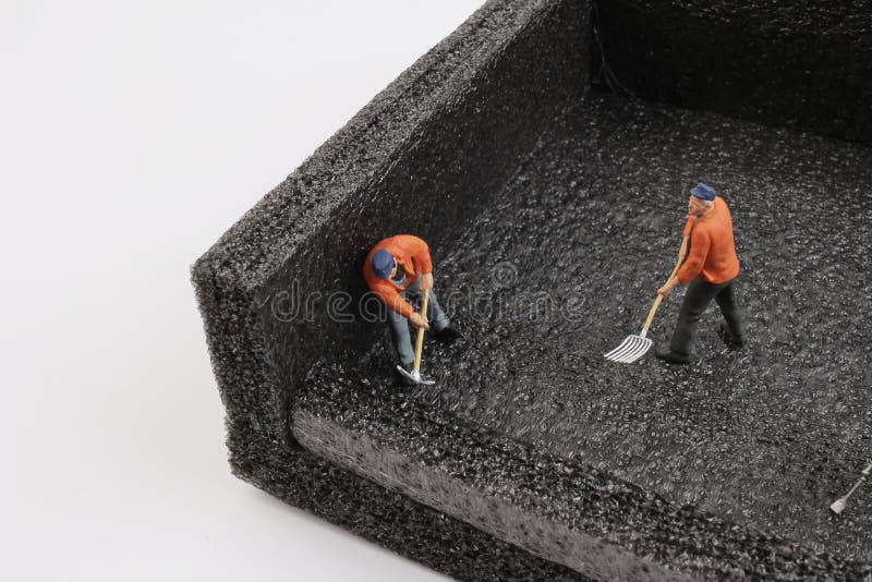 Small Figure of a Man Digging Concrete Road Stock Photo - Image of ...