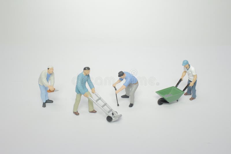 A Small Figure of Mini Worker Stock Image - Image of miniature, shift ...