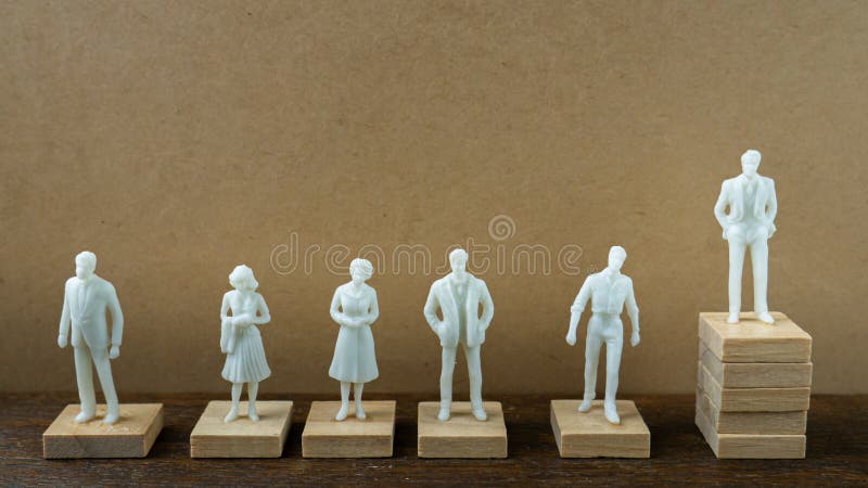 Small Figure Model on Wood Table for Business Content Stock Image ...