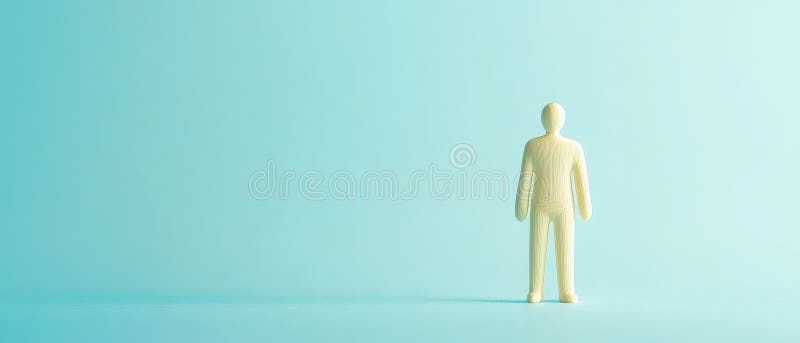 Small Figure Stands Alone Against a Blue Backdrop Stock Photo - Image ...