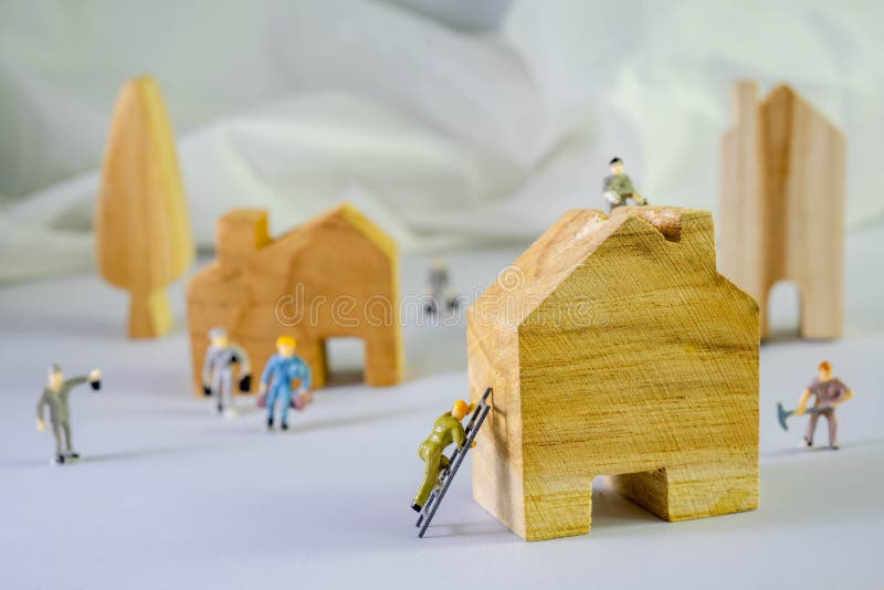 Small Figure Worker and House Model. House Building Concept Stock Image ...