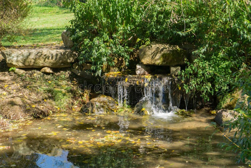 Small Fish Pond and Waterfall Stock Image - Image of lake, background ...
