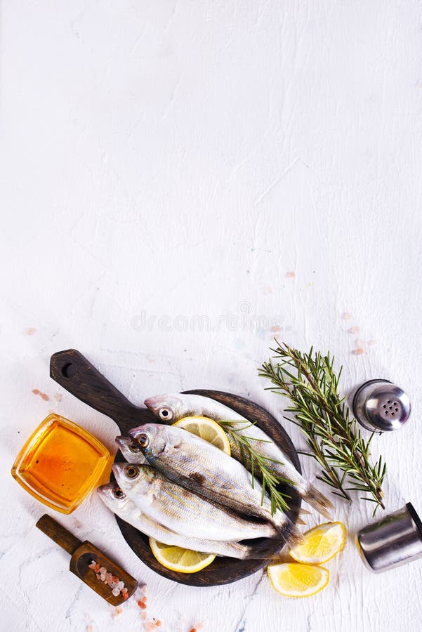 Small Fish with Salt and Spice on Board Stock Image - Image of fruit ...