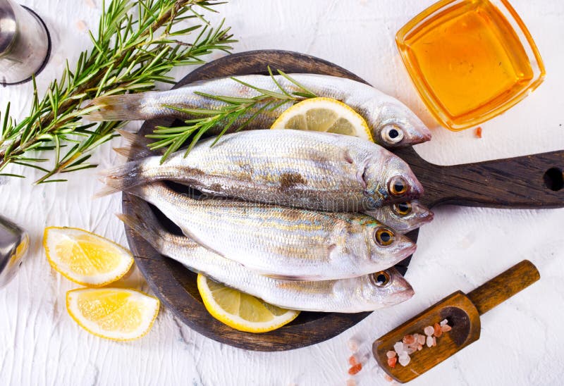 Small Fish with Salt and Spice on Board Stock Image - Image of fish ...