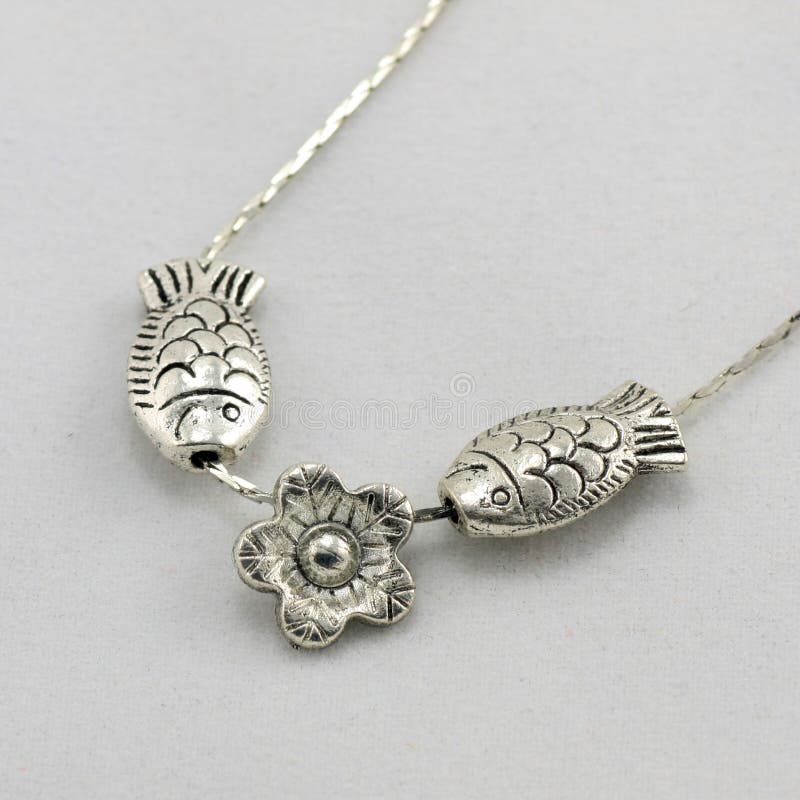 Small Fish-shaped Silver Necklace Stock Image - Image of bless, china ...